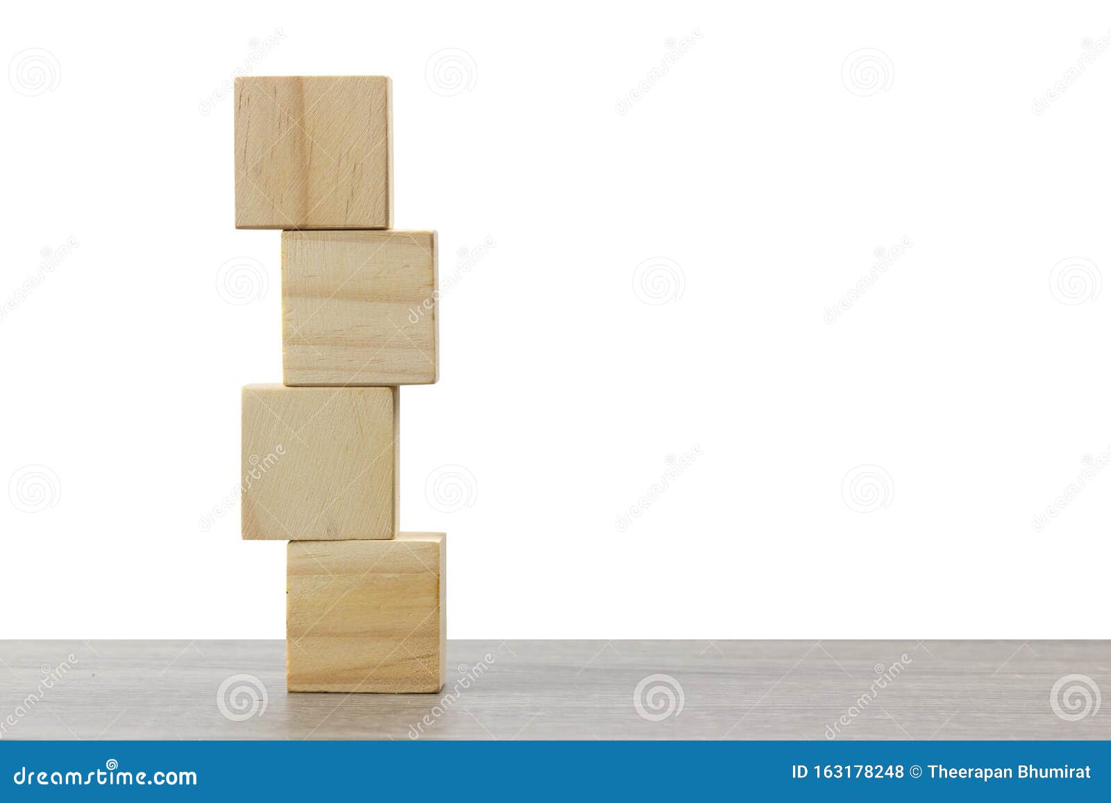 Stack of Wooden Block on Wood Table Against White Background Stock ...