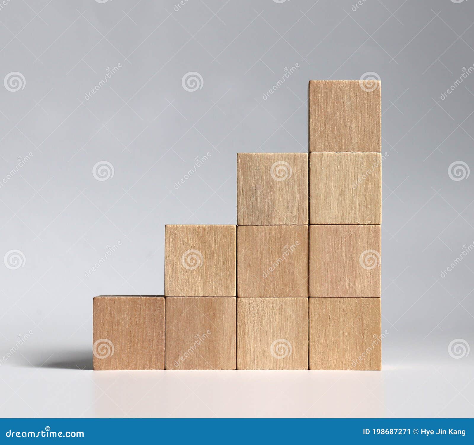 A Stack of Wooden Blocks Stacked in the Shape of a Staircase. Stock ...