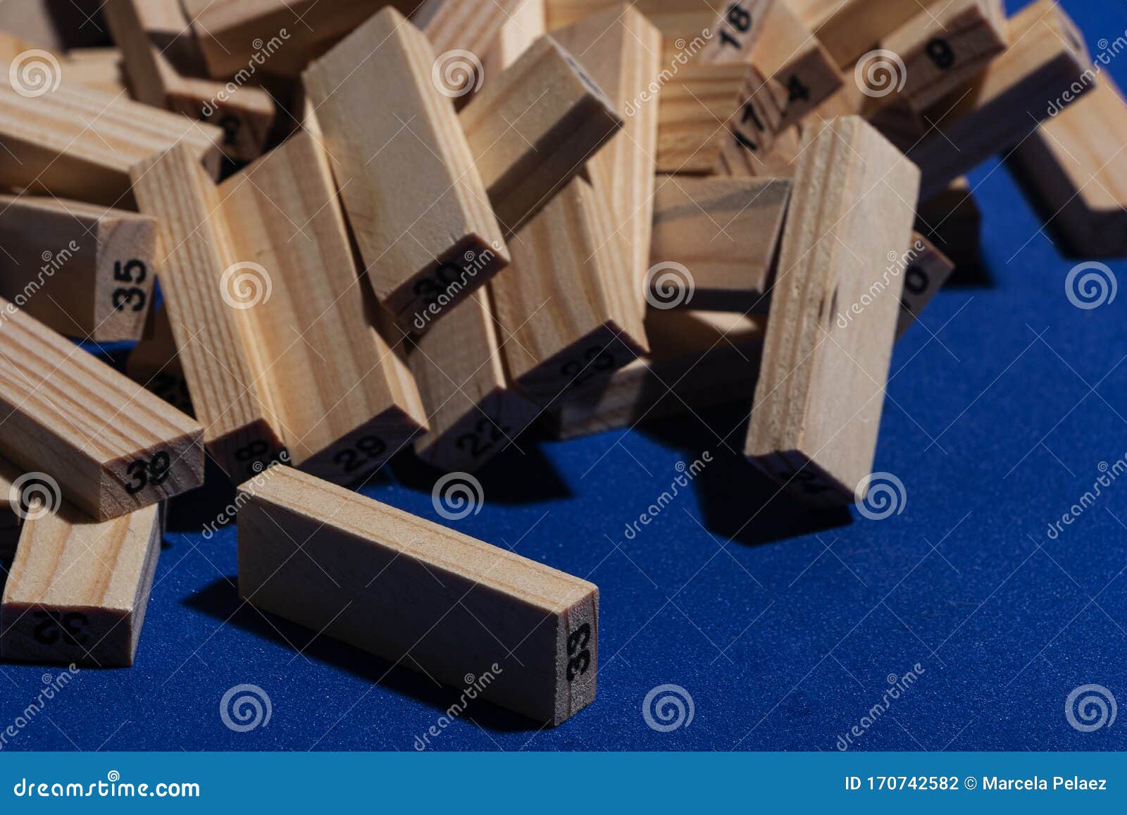 Stack of Wooden Blocks on Table in Classic Blue Color with Hard Light ...