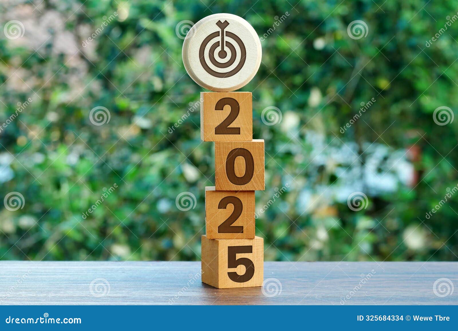 Stack of Wooden Blocks with the Year 2025 Engraved and a Target Sign at ...