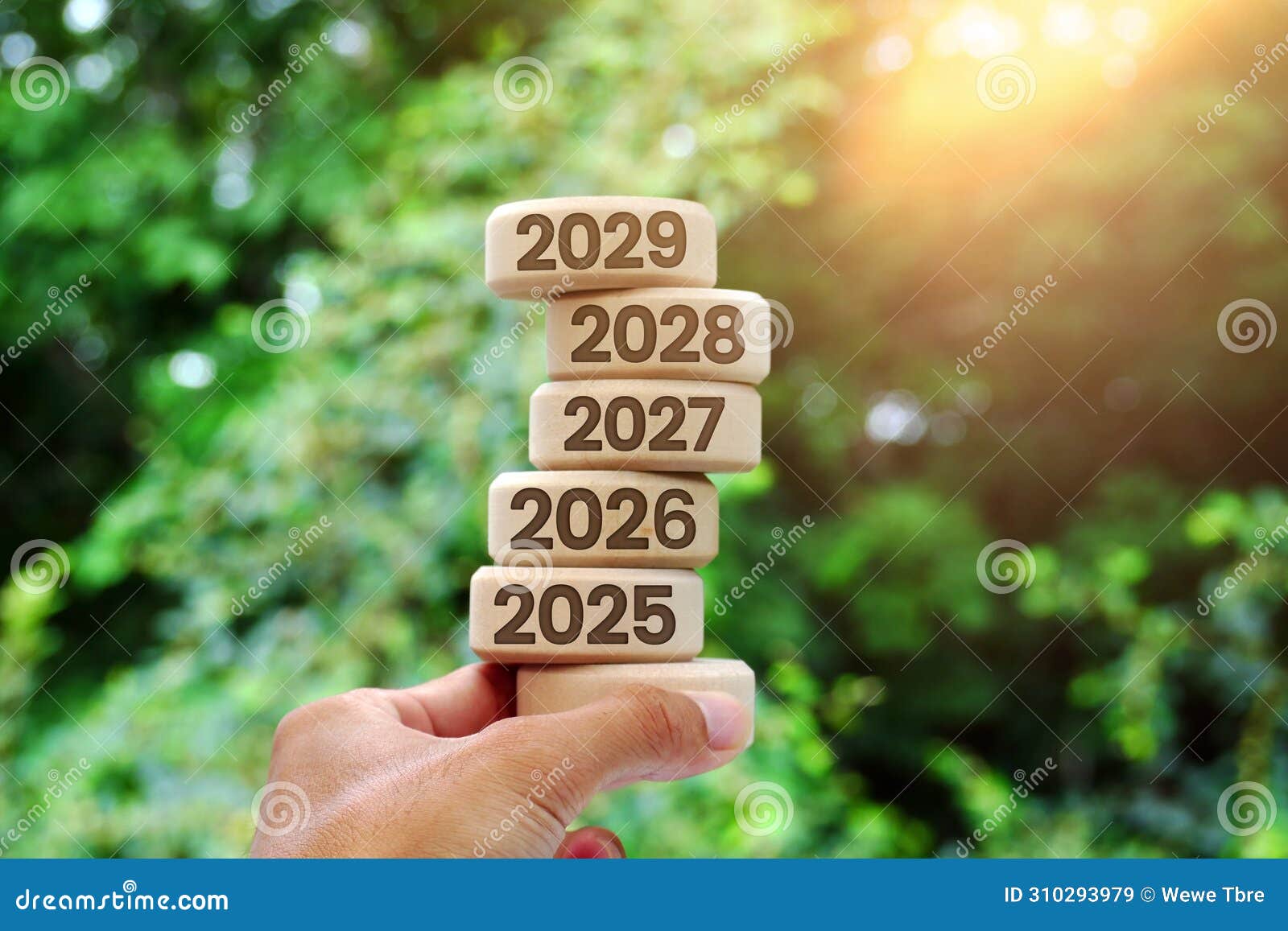 Stack of Wooden Blocks with Years 2025 To 2029 in Man S Hand Stock ...
