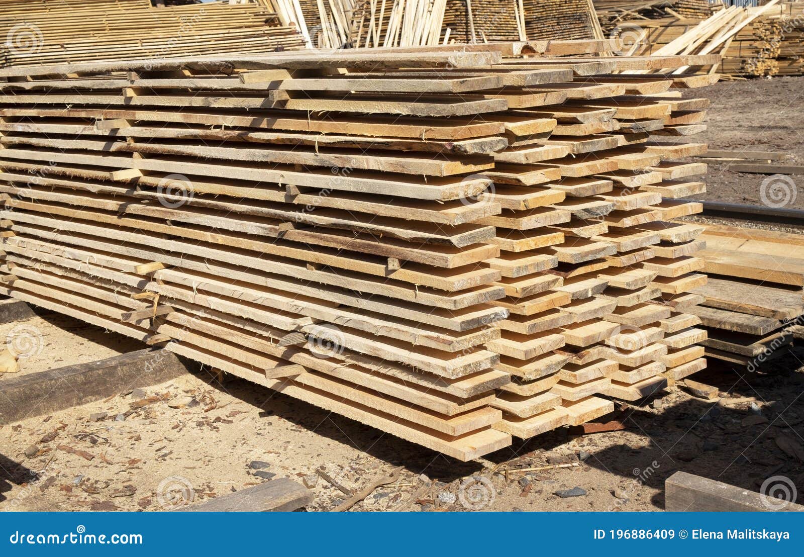 Stack of Wooden Planks Outdoors in a Warehouse Stock Image - Image of ...