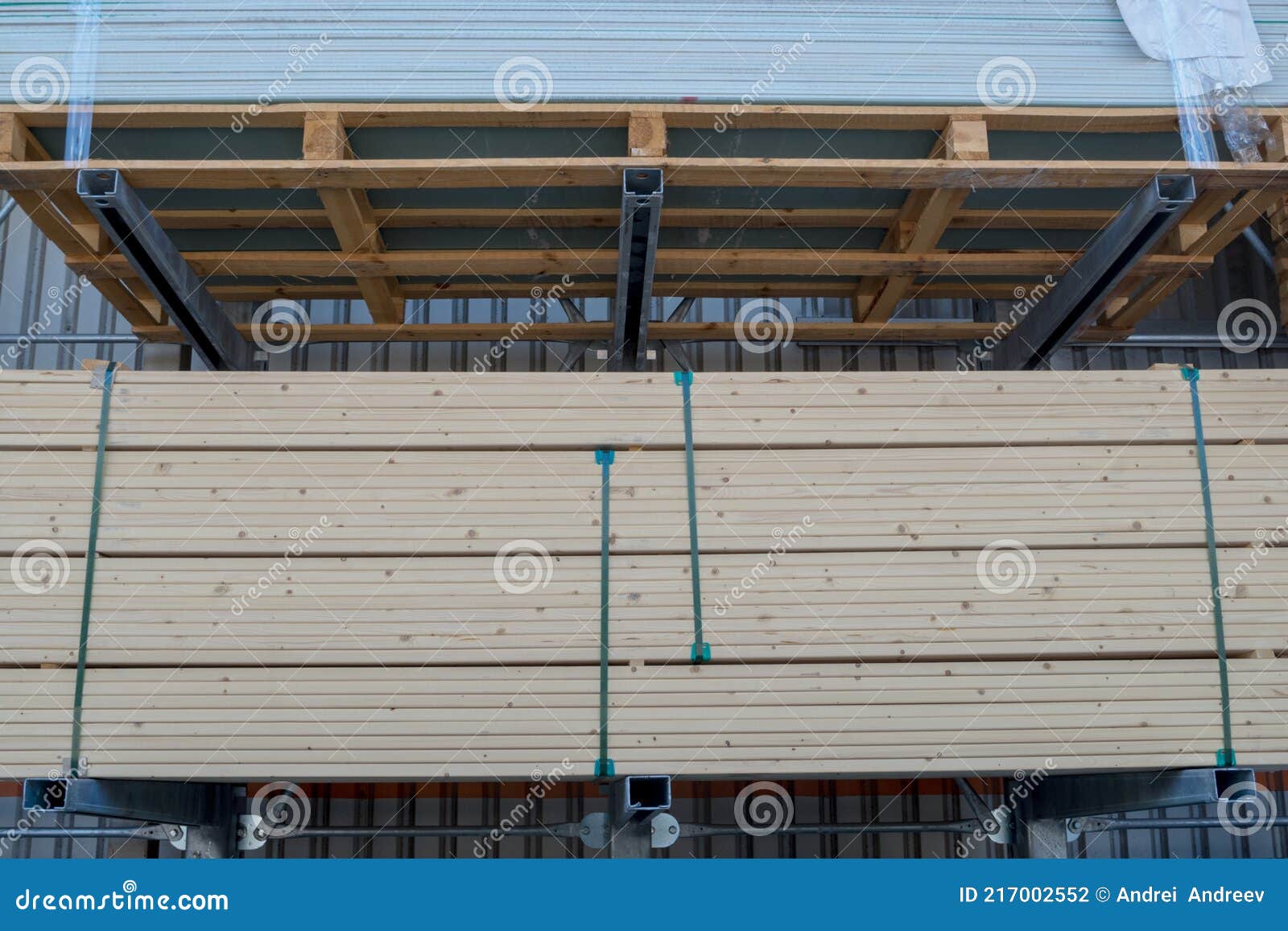 Stack of Wooden Slats, Fastened with Green Ties, Lying on Holders ...