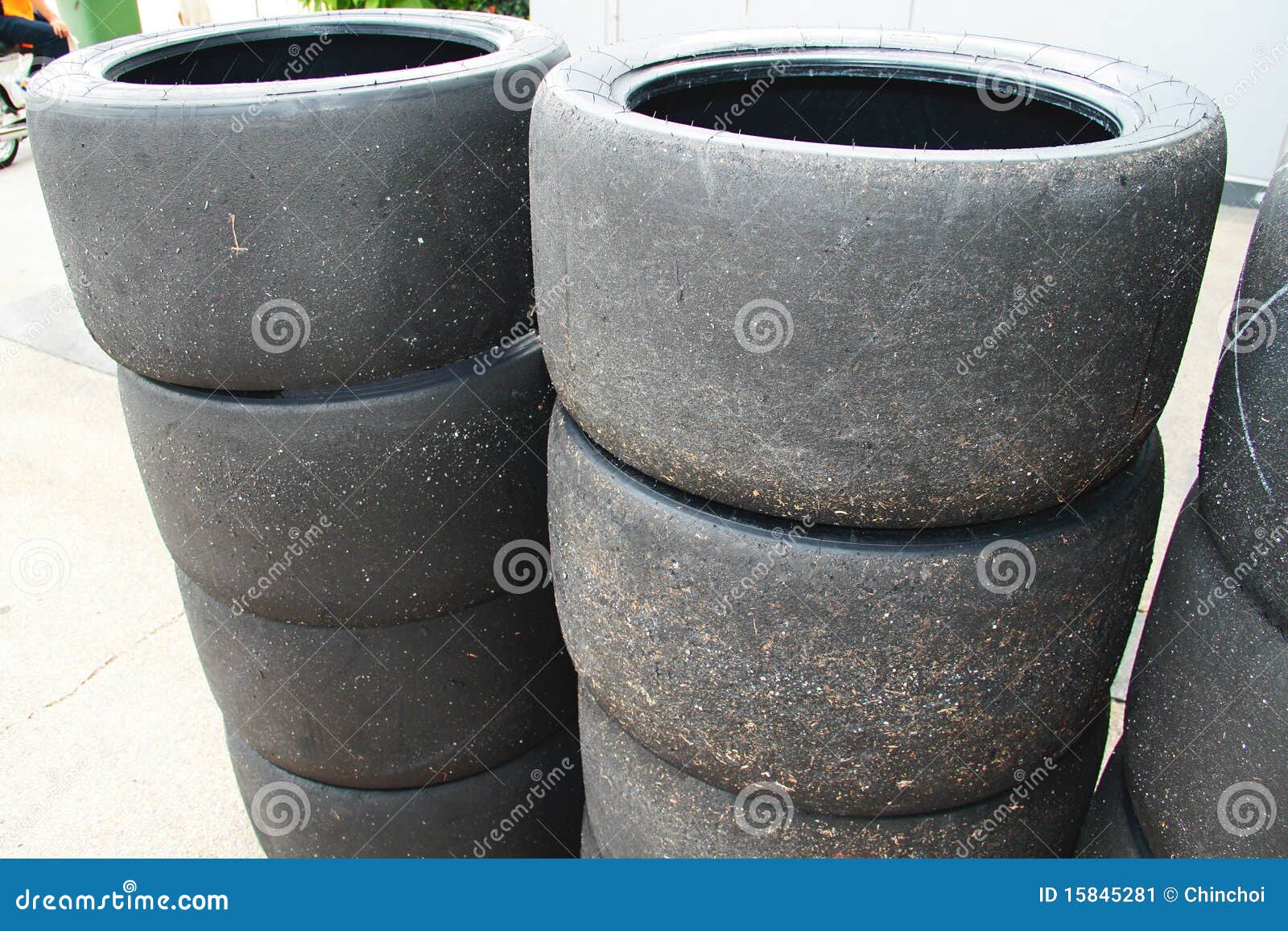 Stack of worn racing tyres stock image. Image of carbon - 15845281