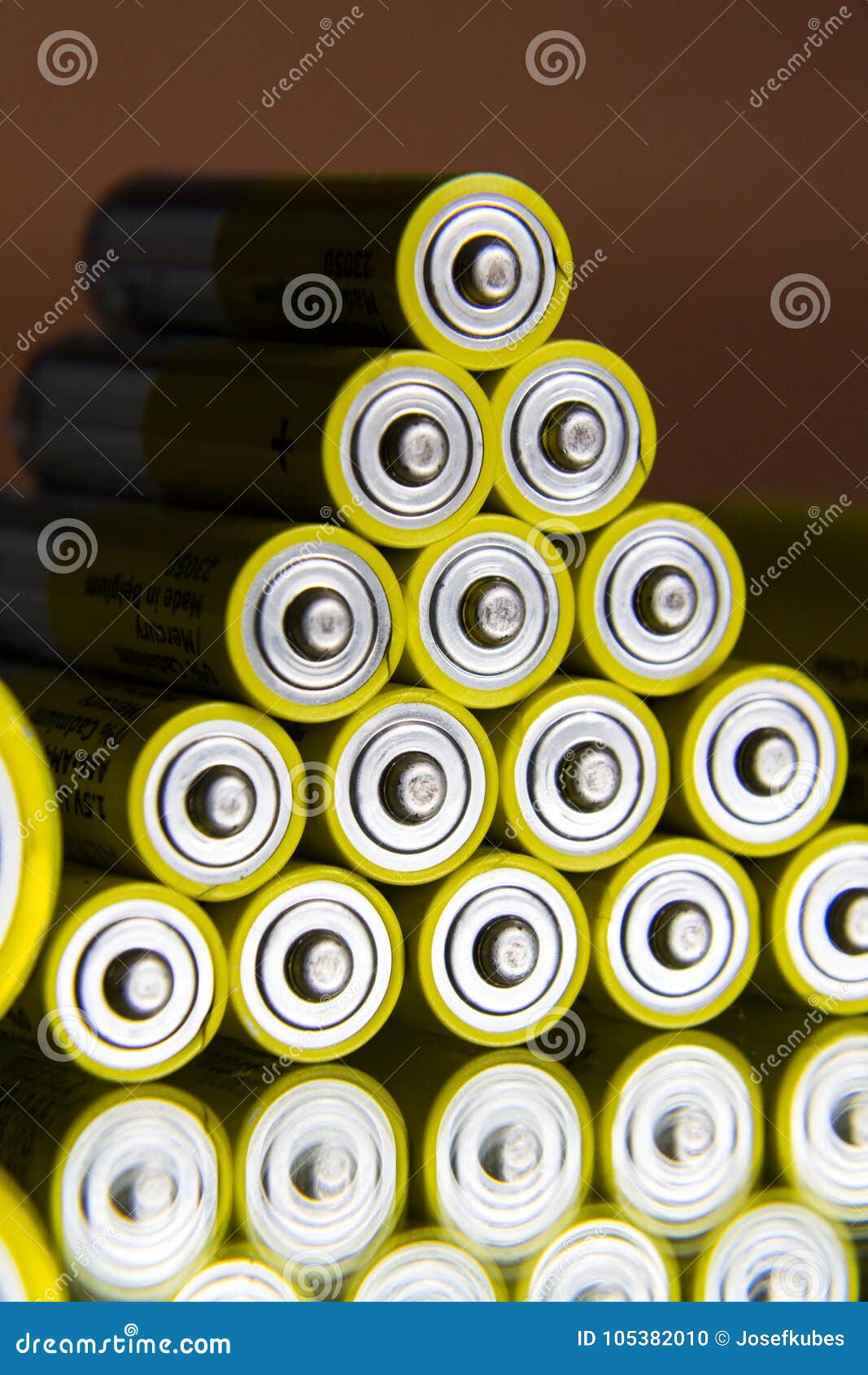 Stack of Yellow AA Batteries Close Up, Electricity Storage Concept ...
