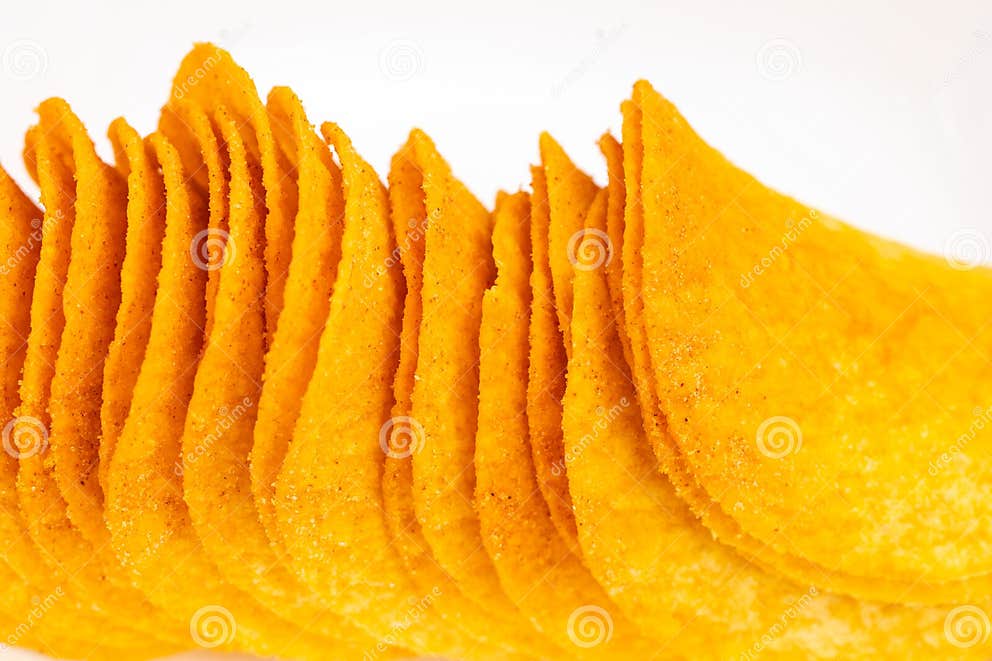 A stack of yellow chips stock photo. Image of background - 356554714