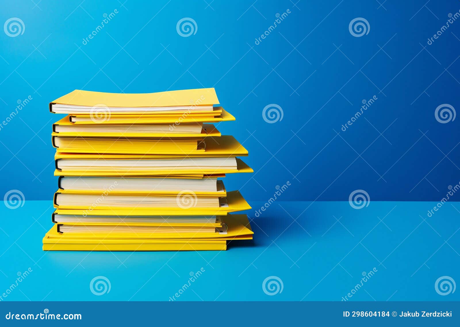 Stack of Yellow Folders with Documents on a Blue Background. Stock ...