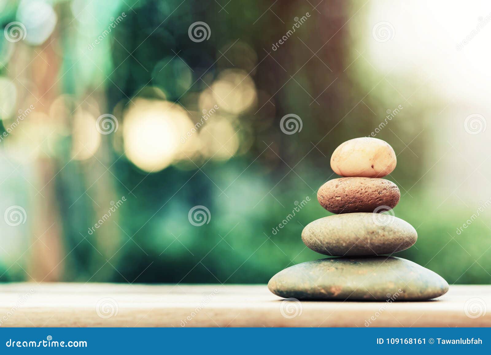 Stack of Zen Stones on Ground with Blurred Nature Background. Stock ...
