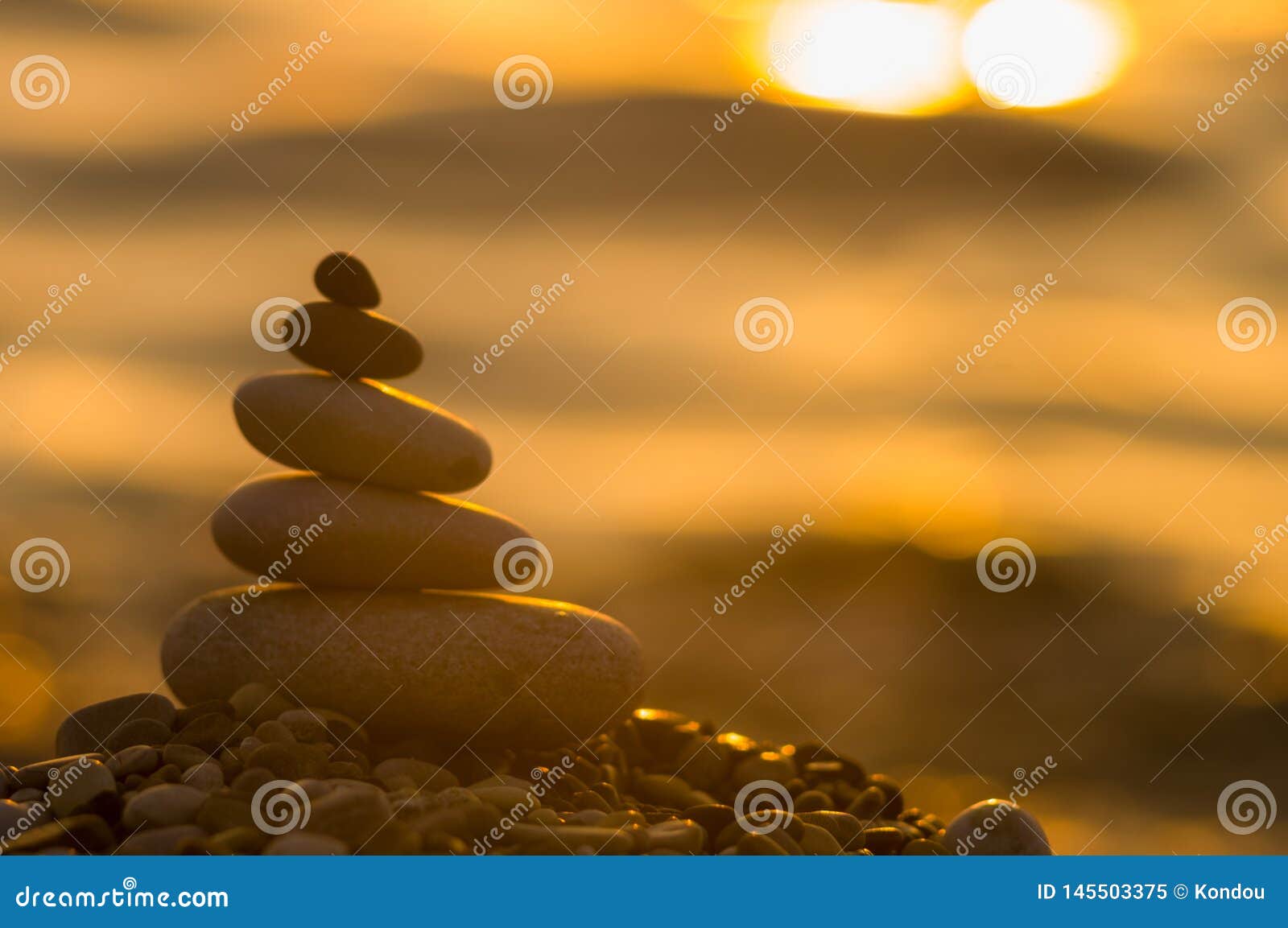 Stack of Zen Stones on Pebble Beach Stock Image - Image of pyramid ...