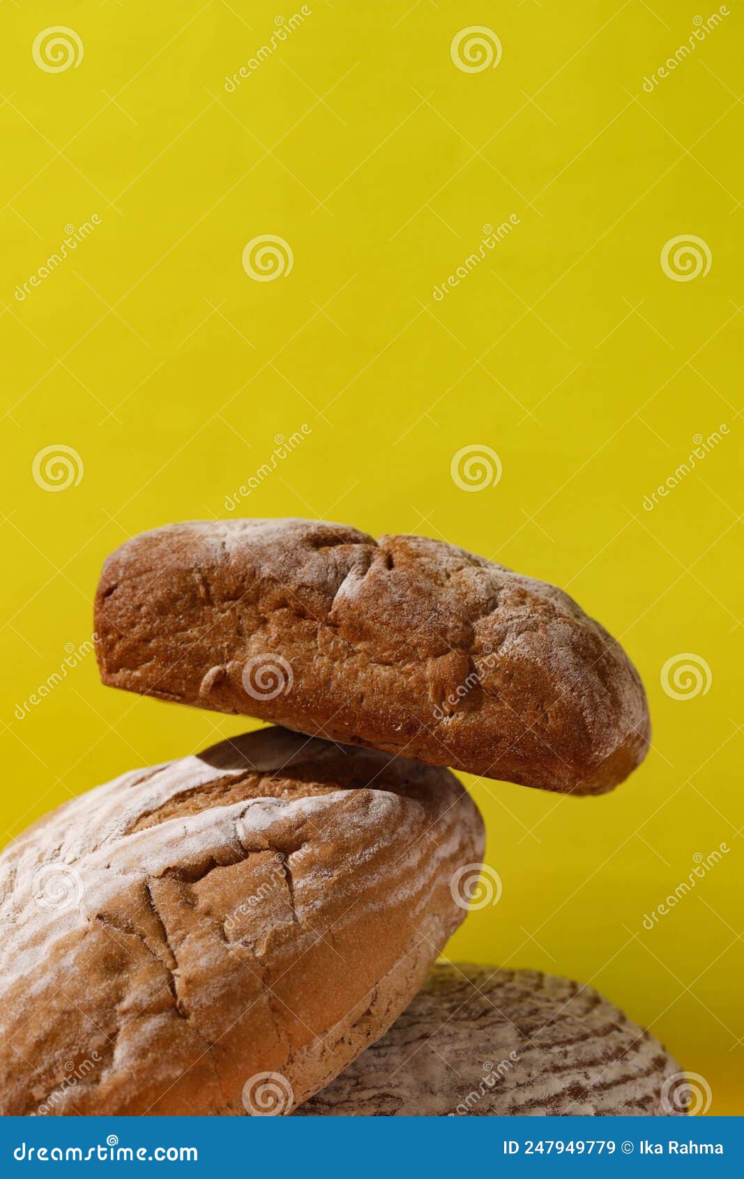 Stackable Rustic Bread on Yellow Background Stock Image - Image of ...