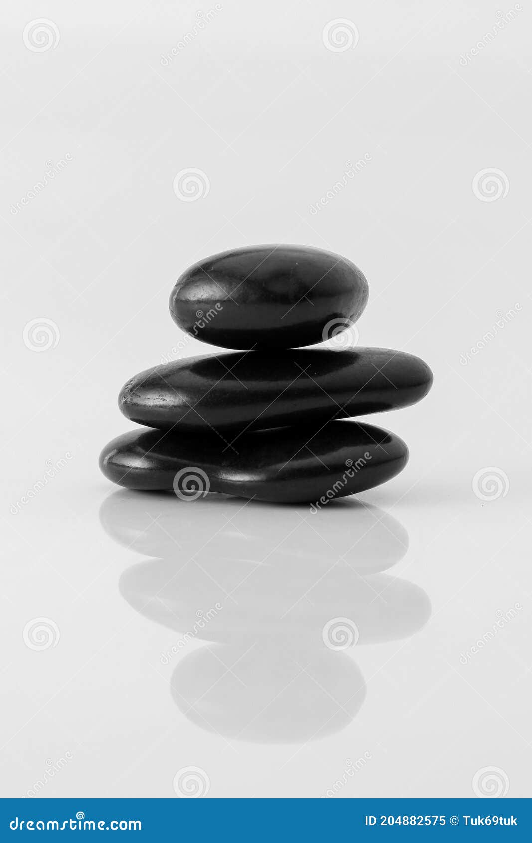 Stacked Black Stones on White Background Stock Image - Image of stones ...