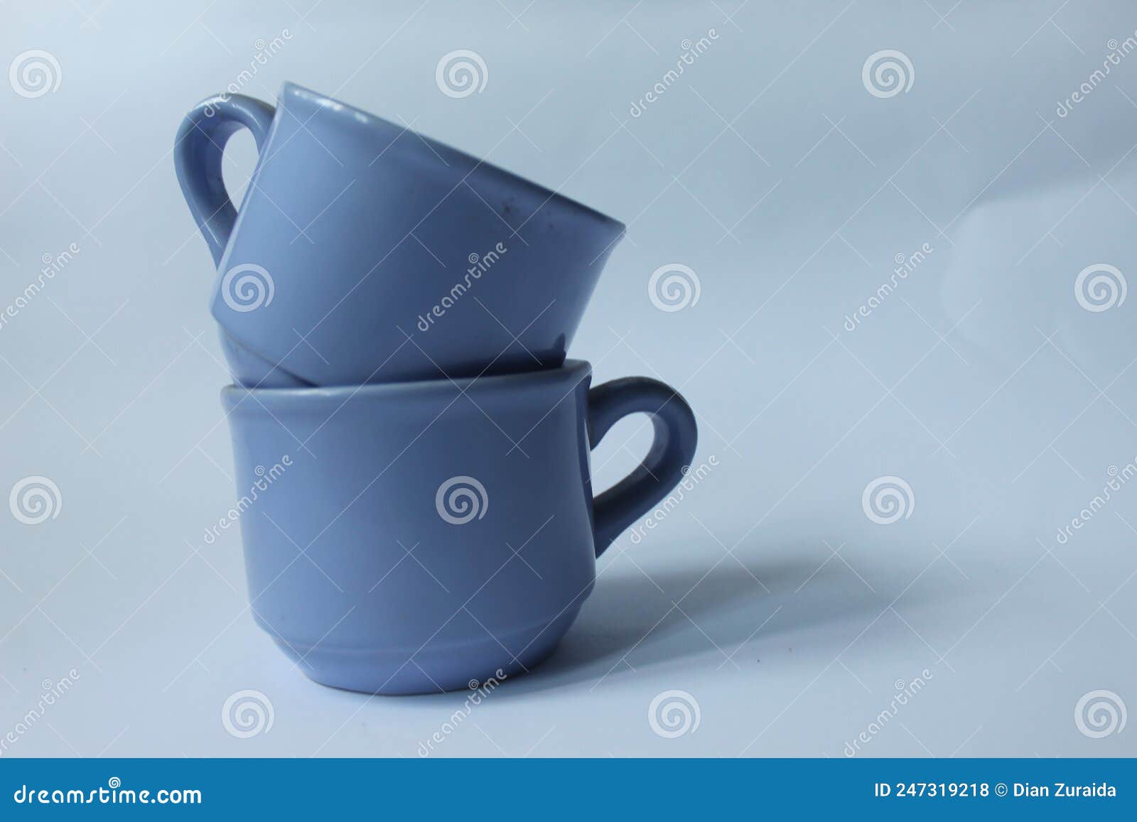 Two stacked cups stock photo. Image of espresso, pottery - 247319218