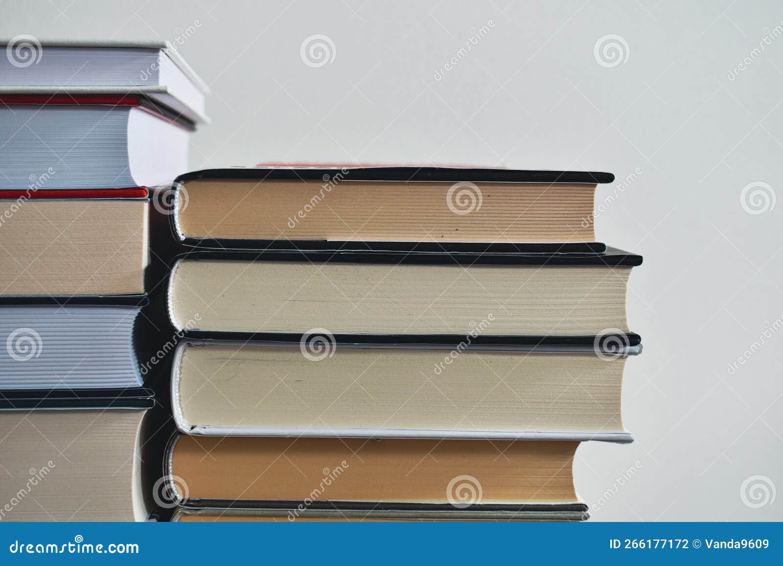 Stacked books close up stock photo. Image of front, books - 266177172