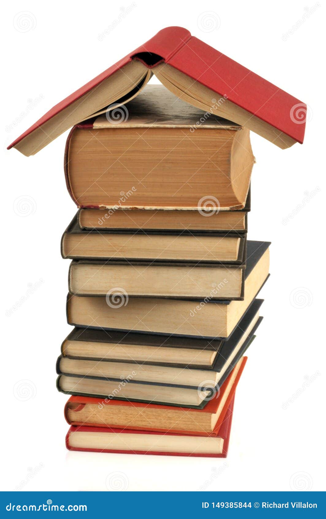 Stack of Books in a House Shape on a White Background Stock Photo ...