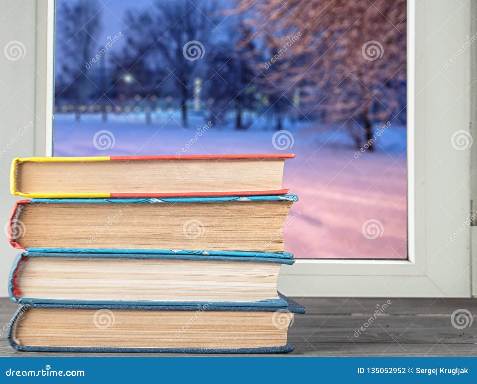 Stacked Books on the Desk Against the Window Stock Photo - Image of ...