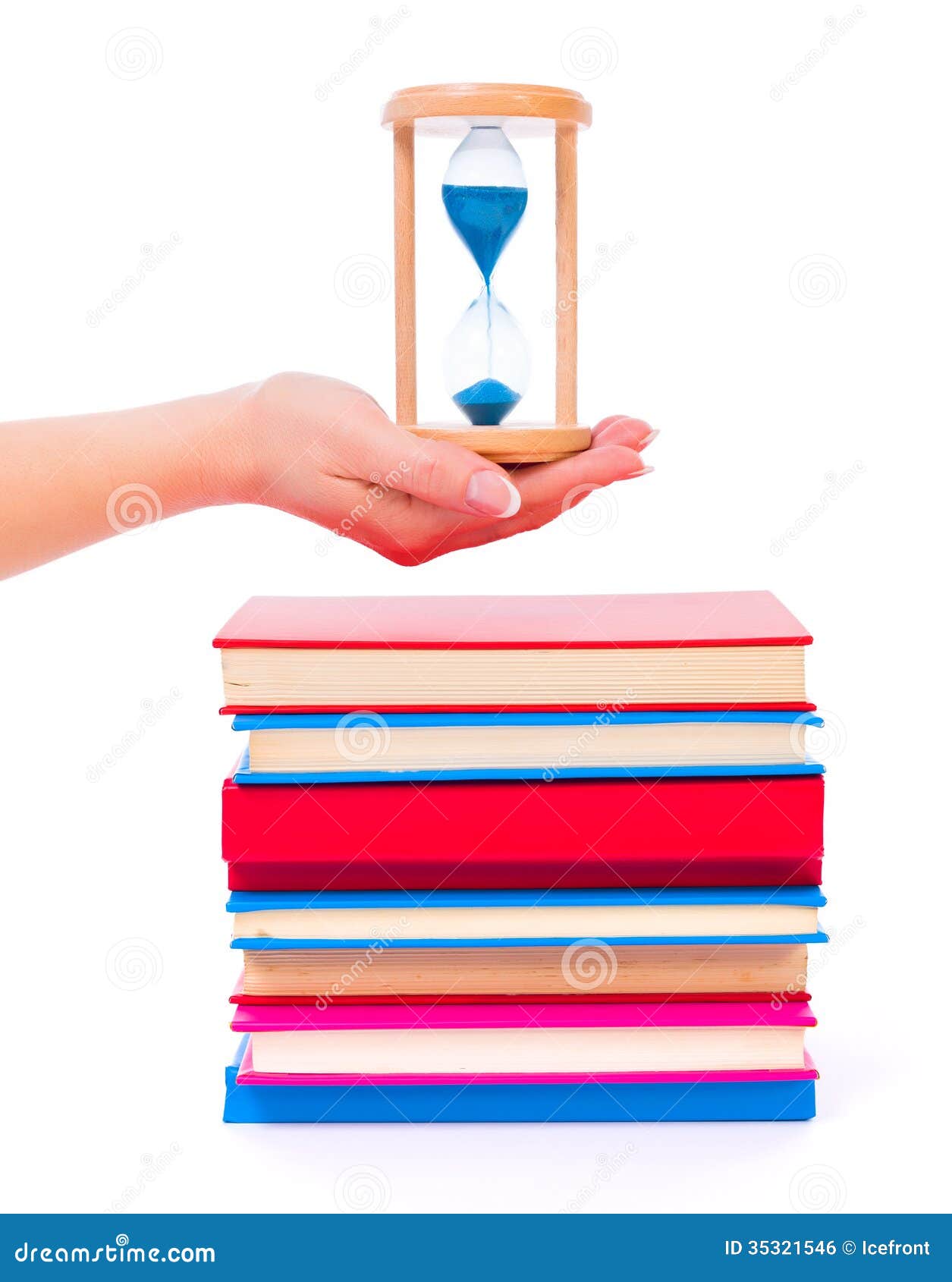 Stacked Books And Hourglass Stock Photo - Image of stack, colors: 35321546