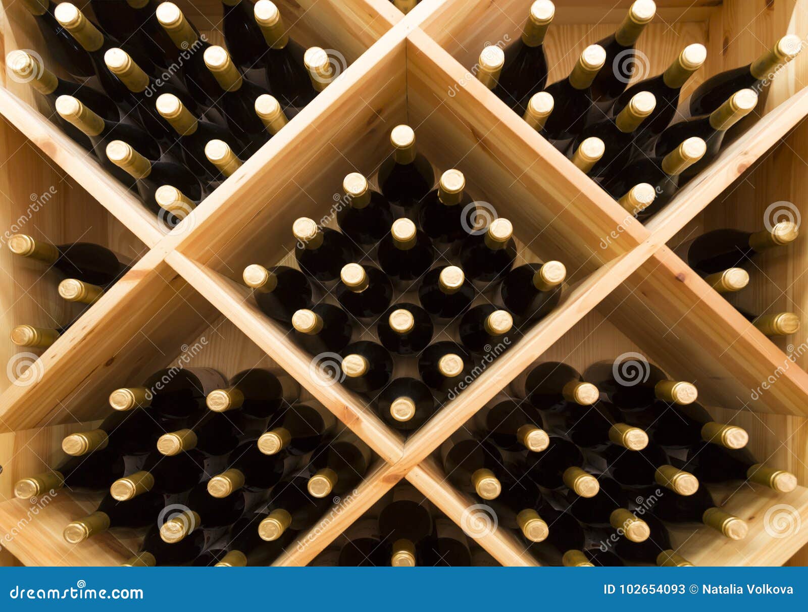 Stacked Bottles of Grape Wine in a Wine Cellar Stock Image - Image of ...