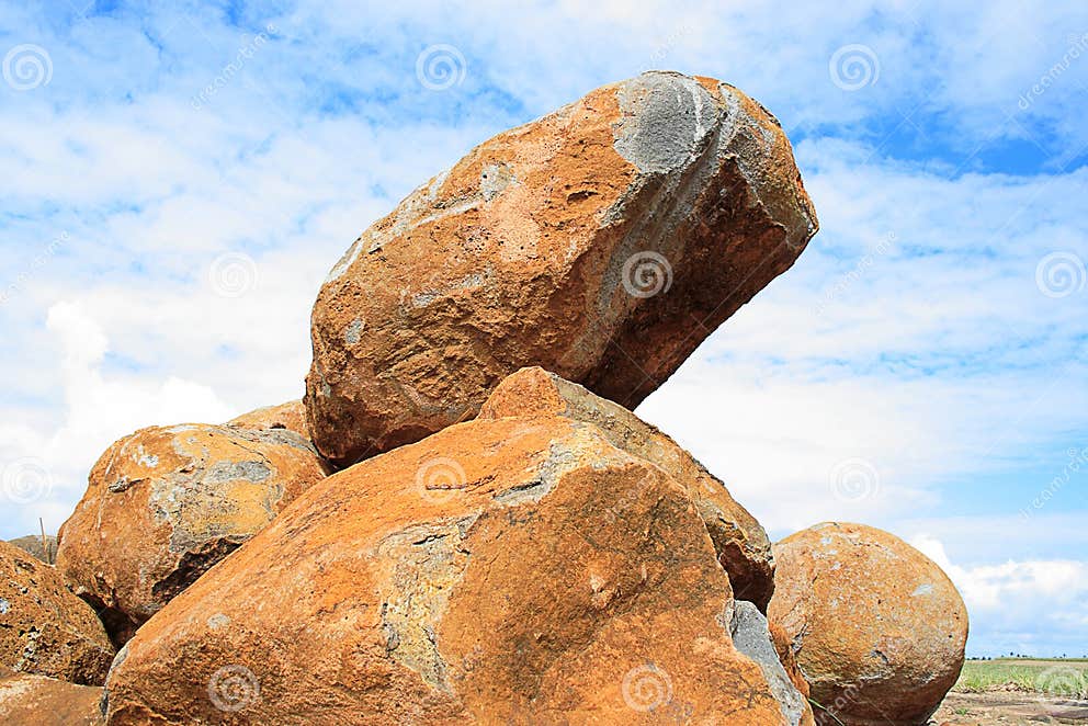 Stacked boulders stock image. Image of clouds, boulders - 26040391