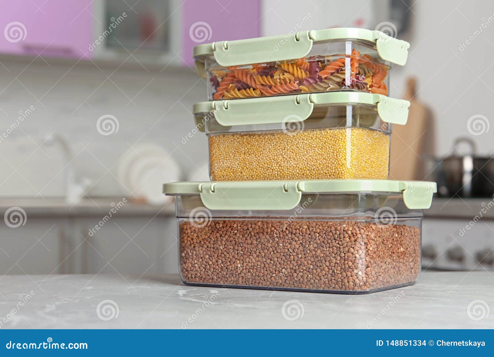 Stacked Boxes with Different Food on Table in Kitchen Stock Photo ...