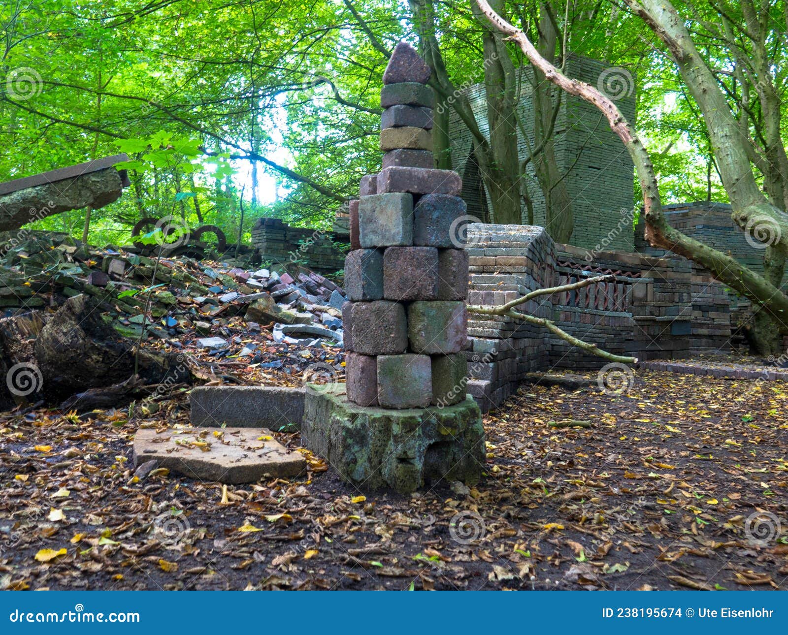 Stacked Bricks in the Forest Stock Photo - Image of forest, pyramid ...