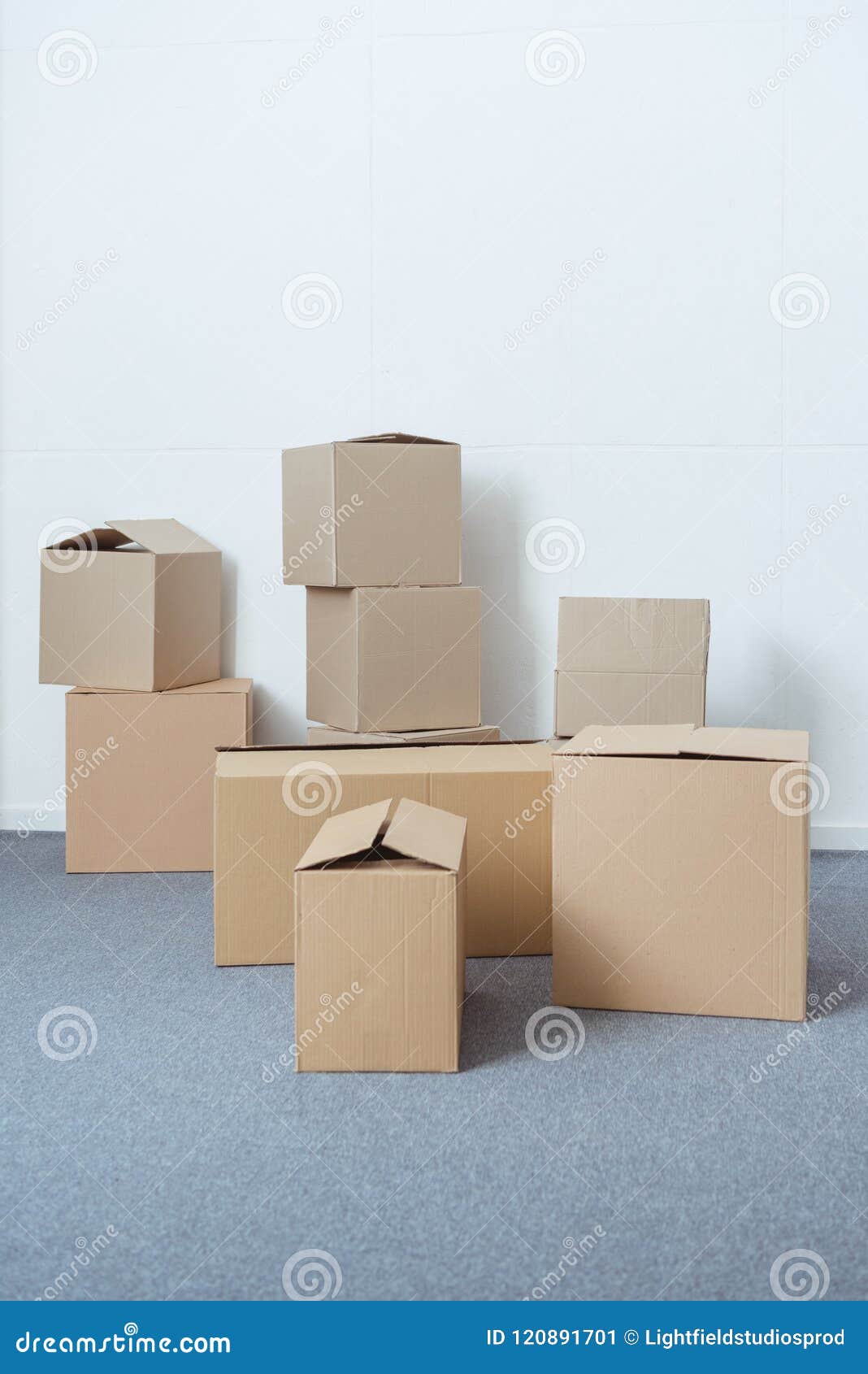 Stacked Cardboard Boxes in Empty Room Stock Image - Image of packages ...