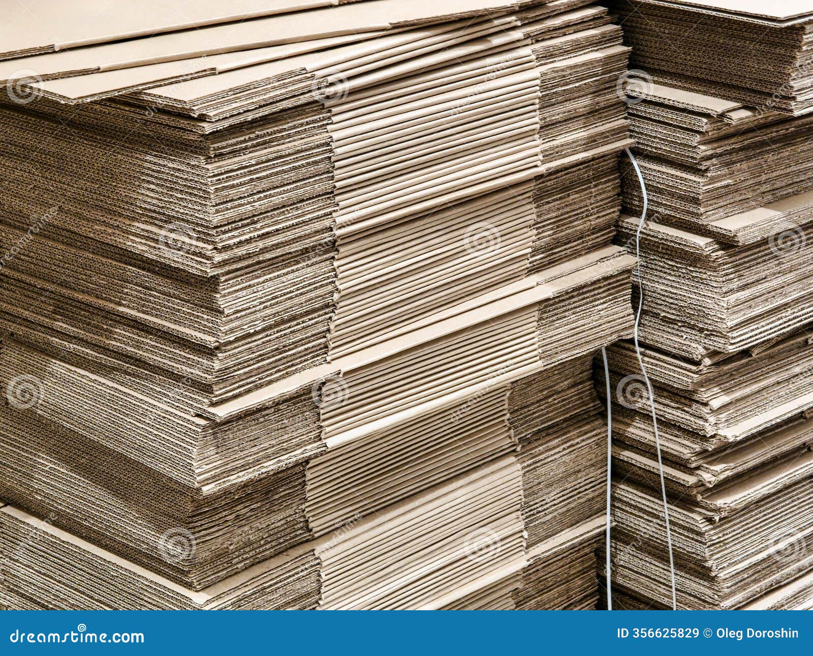 Stacked Cardboard Sheets Organized in a Warehouse Ready for Shipment or ...