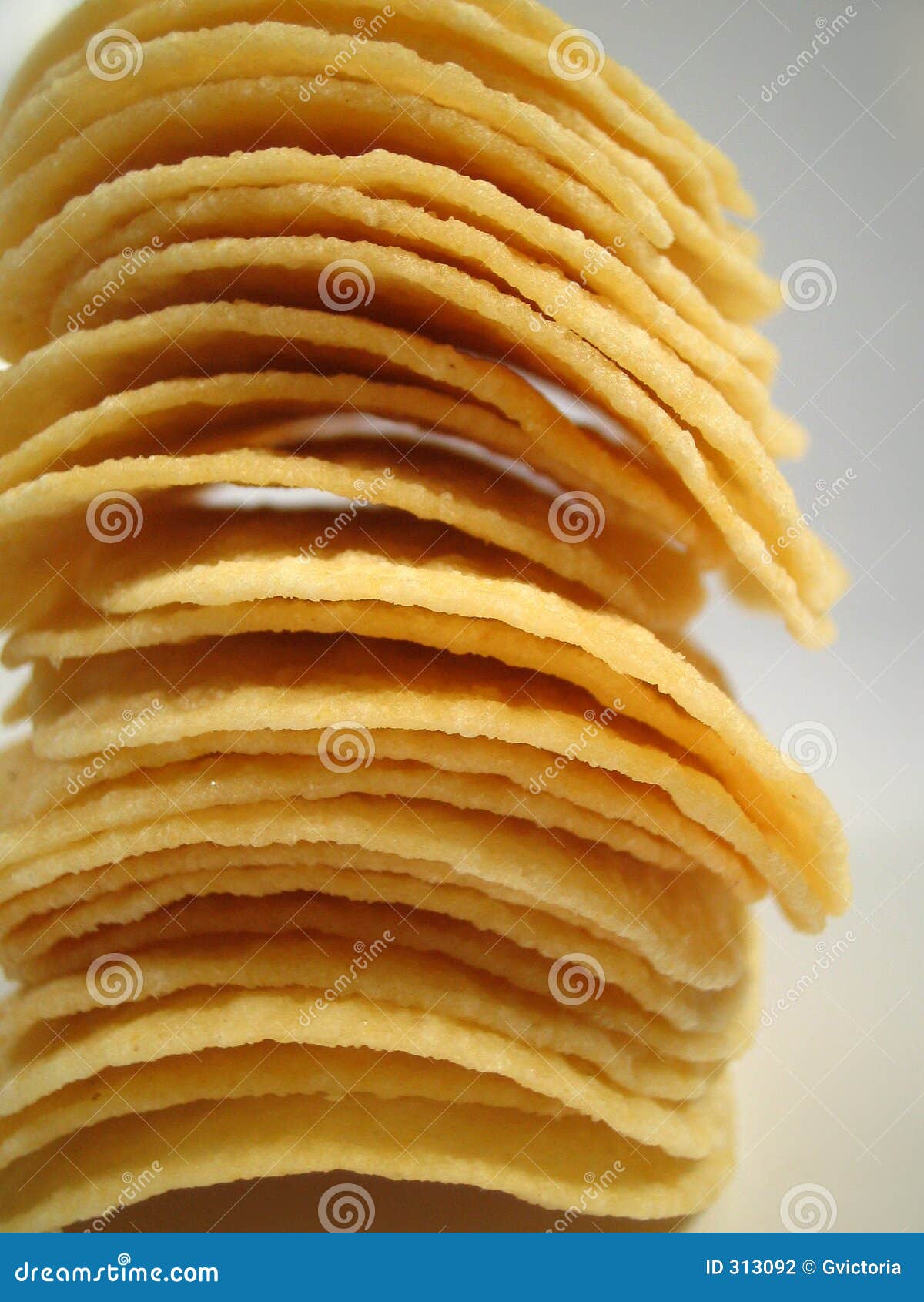 Stacked chips stock photo. Image of crunch, yellow, pile - 313092