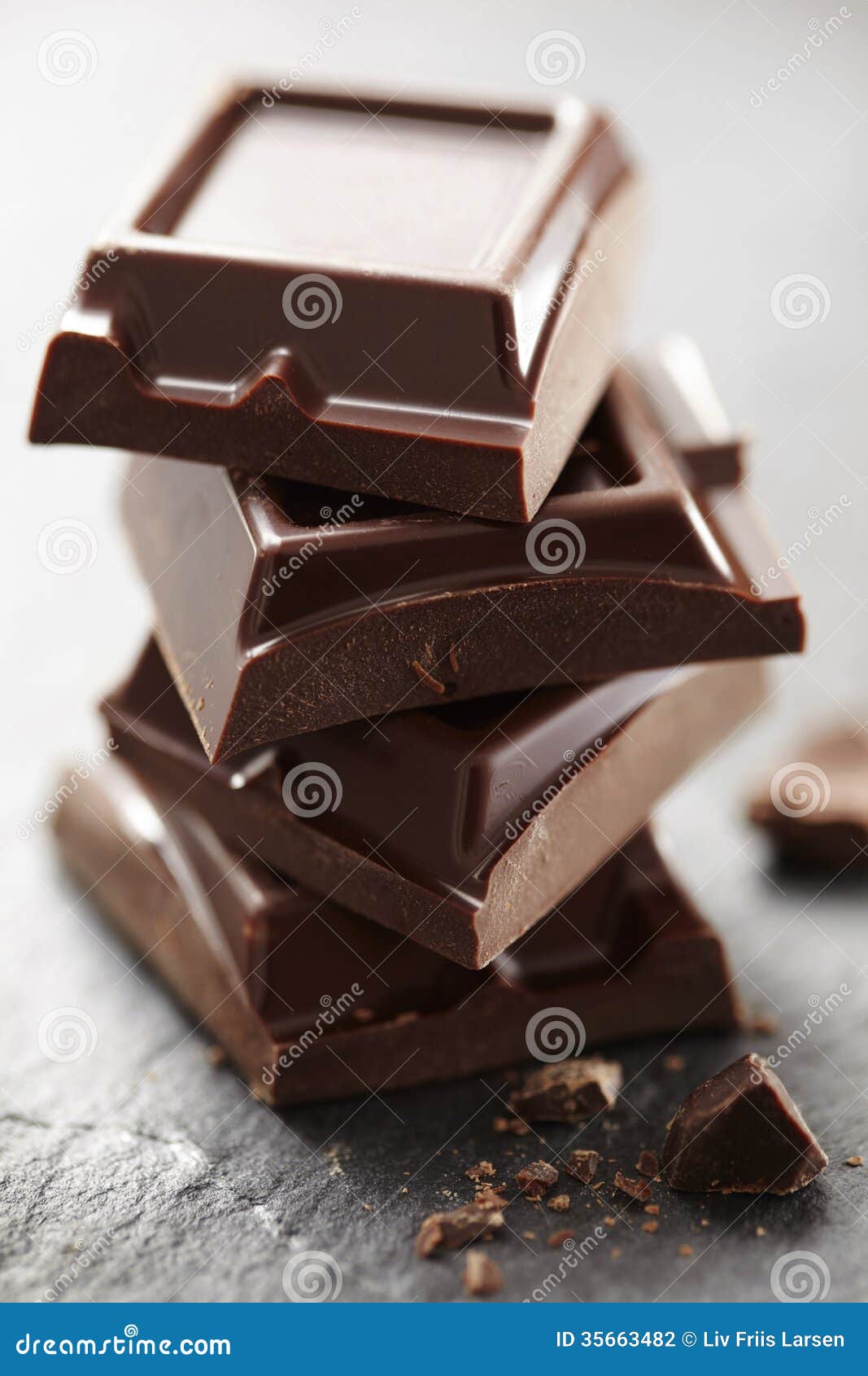 Stacked chocolate pieces stock photo. Image of chocolate - 35663482