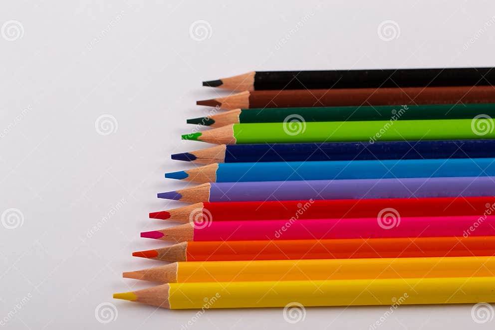 Stacked Colored Pencils on a Light Background Stock Photo - Image of ...