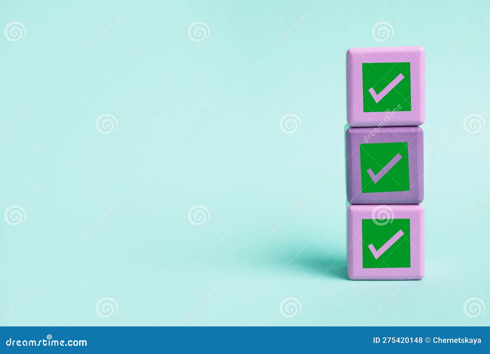 Stacked Cubes with Check Marks on Turquoise Background. Space for Text ...