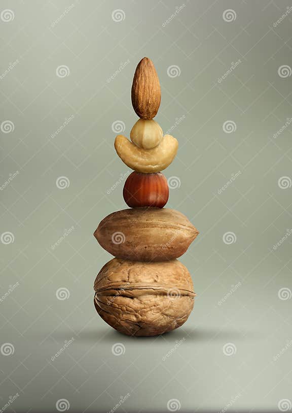 Stacked Different Nuts on Grey Gradient Background Stock Image - Image ...