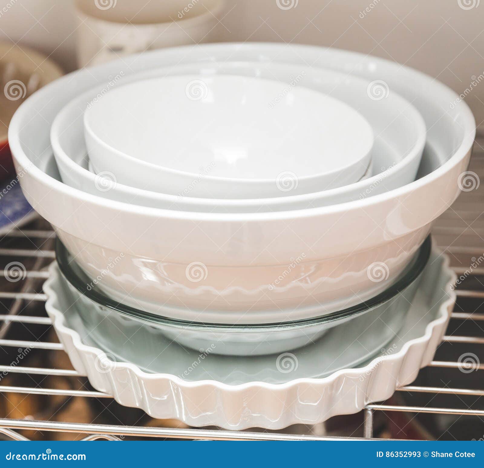 Stacked dishes in kitchen stock image. Image of group - 86352993