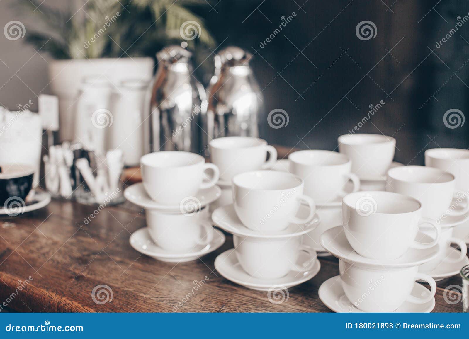 Stacked Empty Teacups with Teaspoons at a Function Over Stock Photo ...