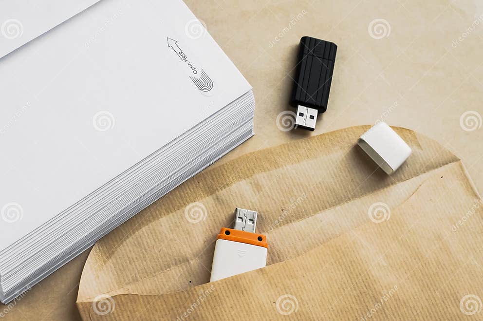 Stacked Envelopes and Flash Drives Stock Photo - Image of drives, stack ...