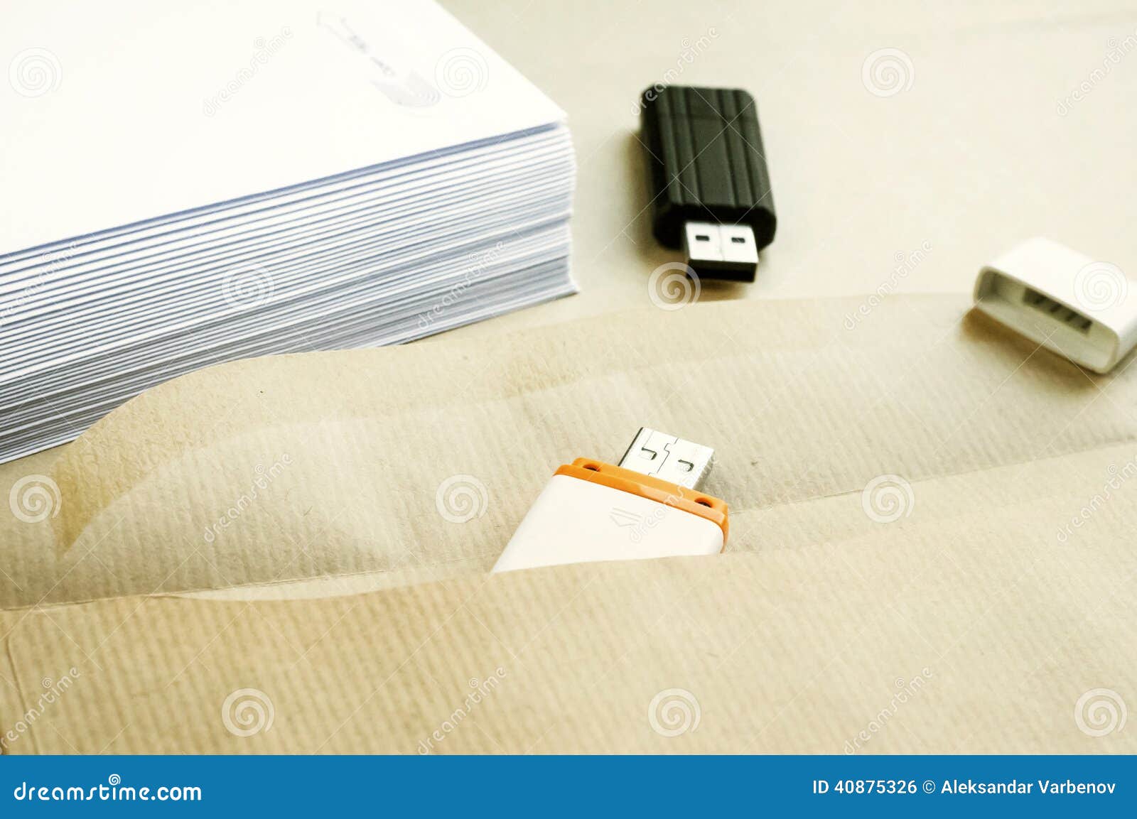 Stacked Envelopes and Flash Drives Stock Photo - Image of product ...