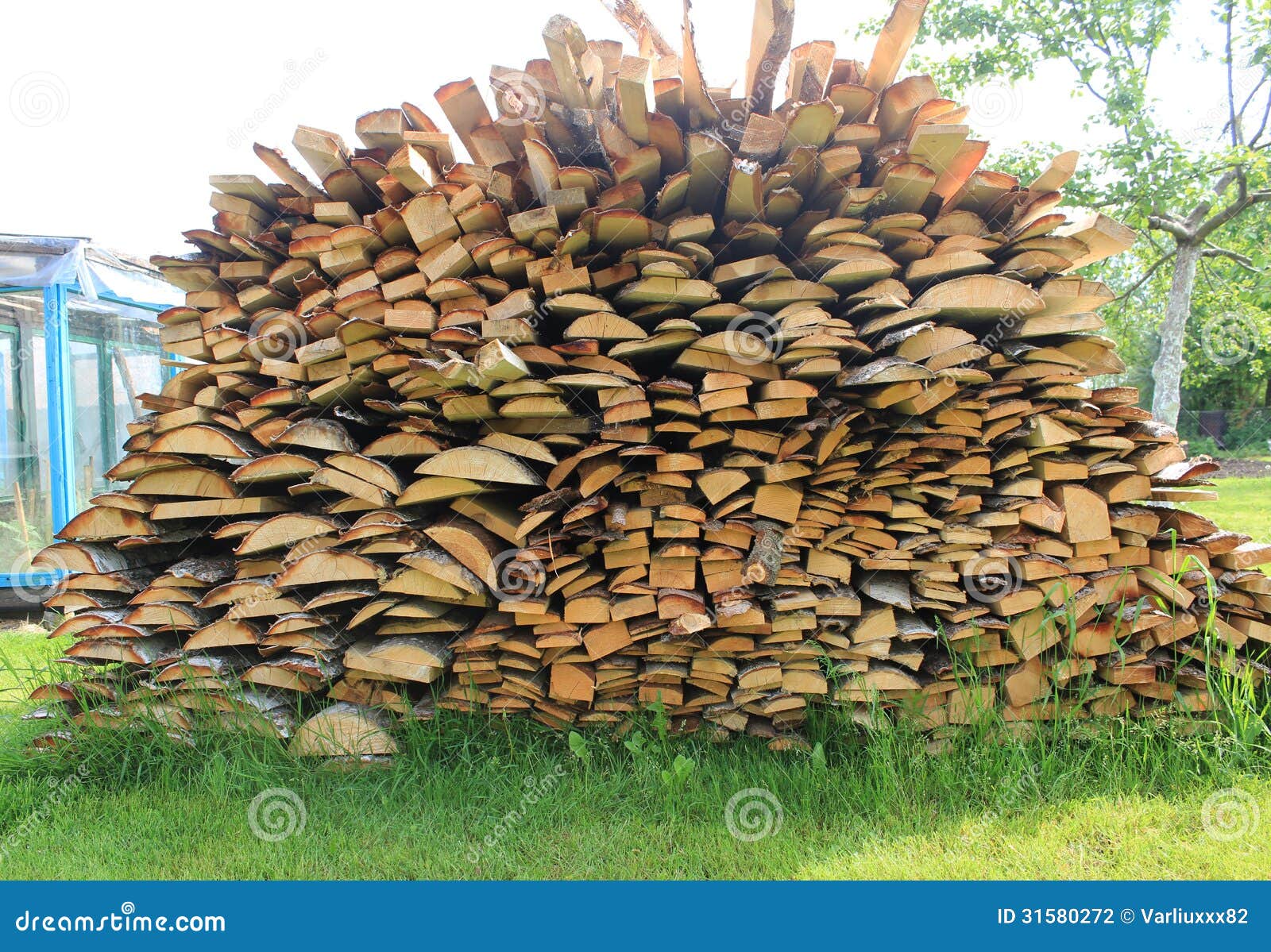 Stacked firewood in a pile stock photo. Image of background - 31580272