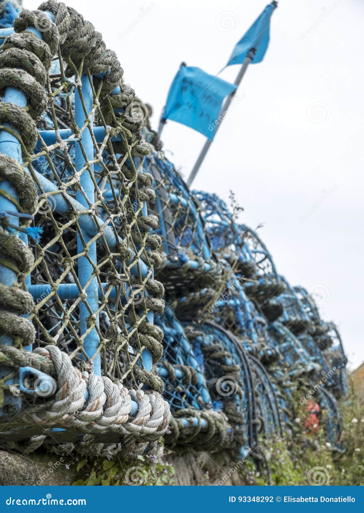 Stacked fishing nets stock photo. Image of fishnet, water - 93348292