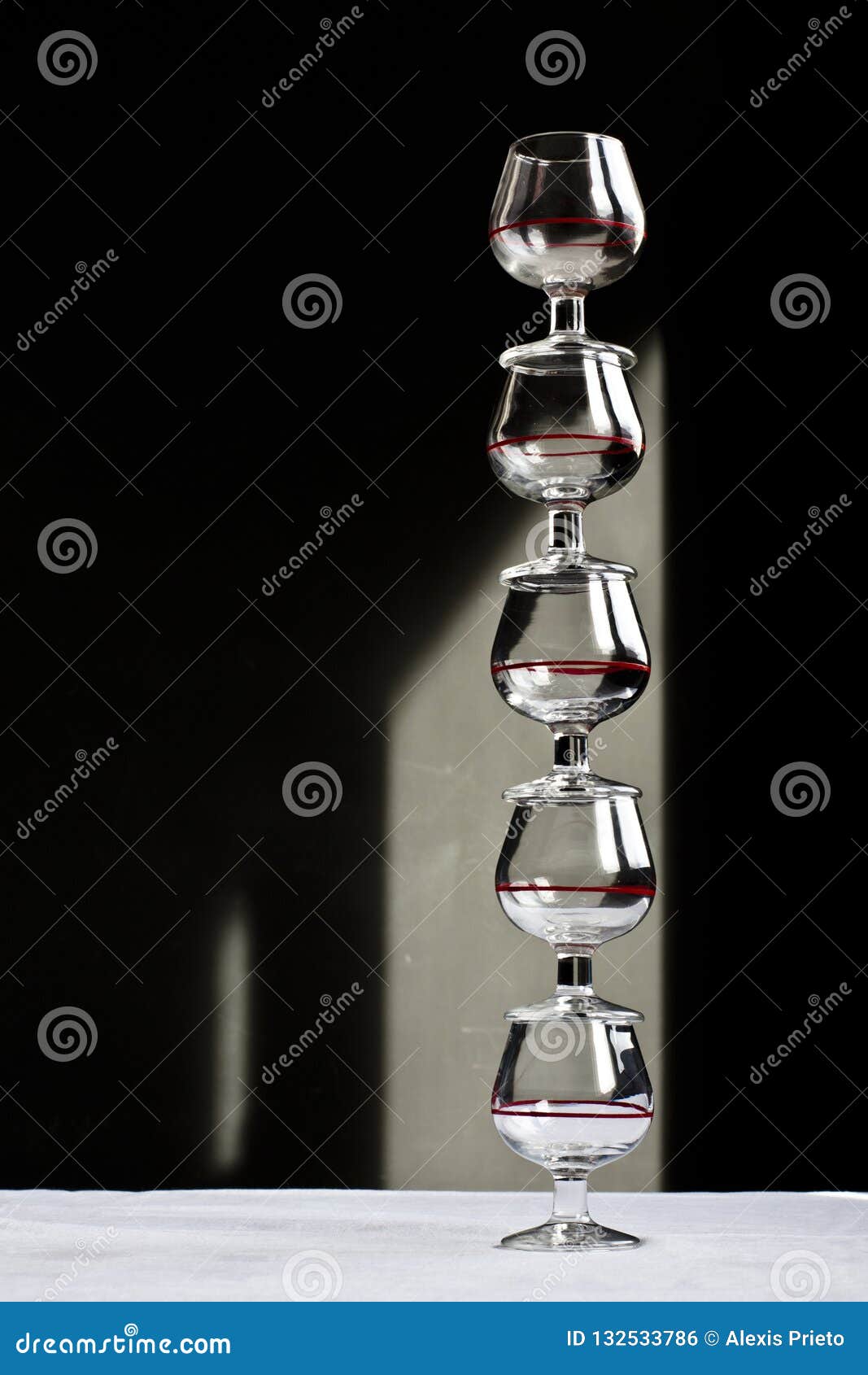Stacked glasses stock photo. Image of four, glass, contrast - 132533786