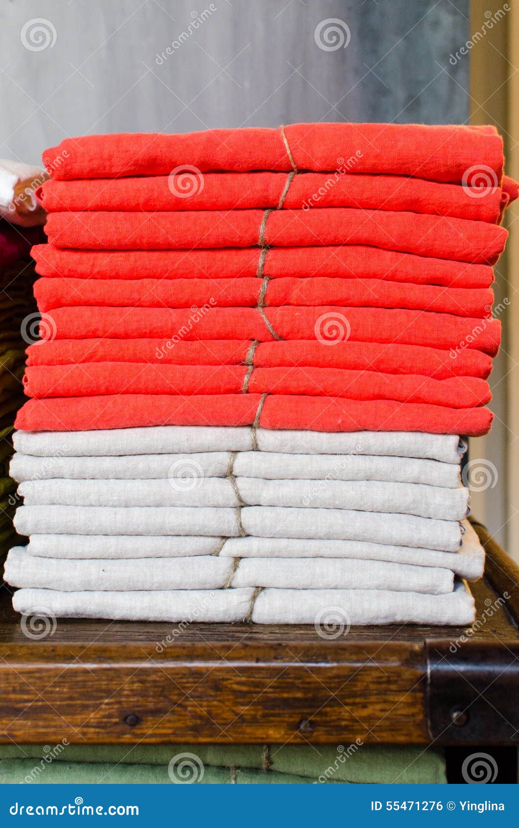 Stacked Linens Red and White on a Table Stock Photo - Image of deco ...