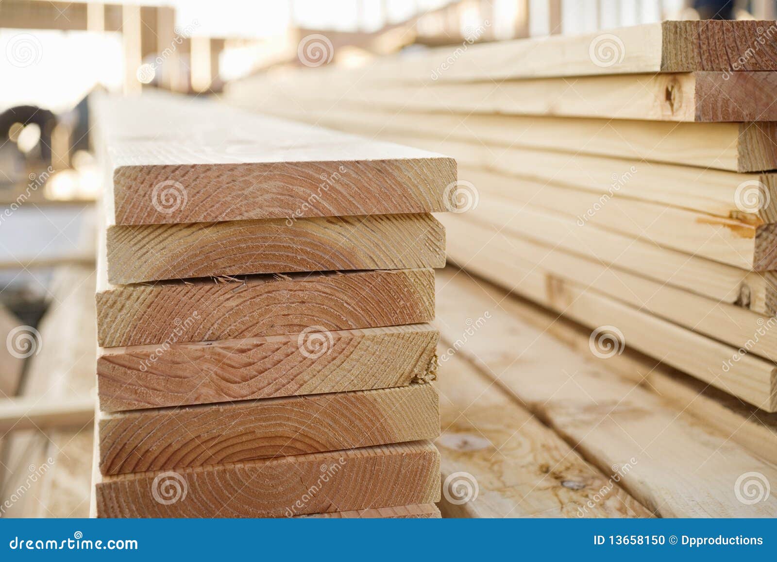 Stacked Lumber at a Building Site Stock Photo - Image of daylight ...
