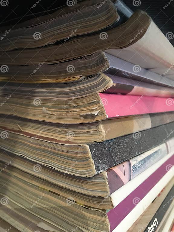 Photo of stacked magazines stock photo. Image of closeup - 199972230