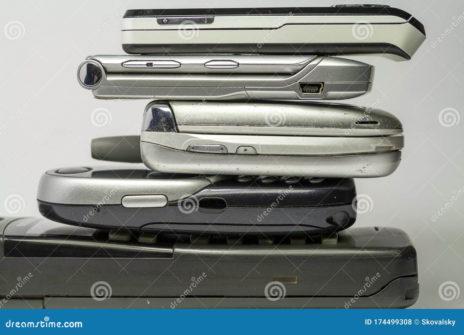 Stacked Old Mobile Phones on White Background Stock Photo - Image of ...