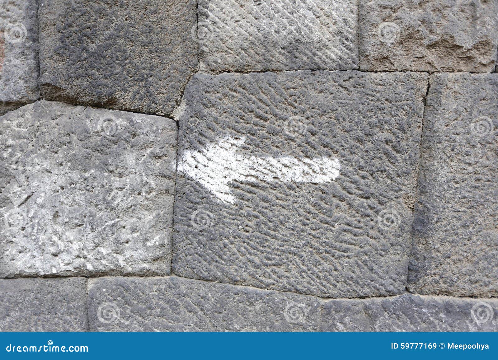 Stacked Old Stone Wall and Symbol White Arrow. Stock Image - Image of ...
