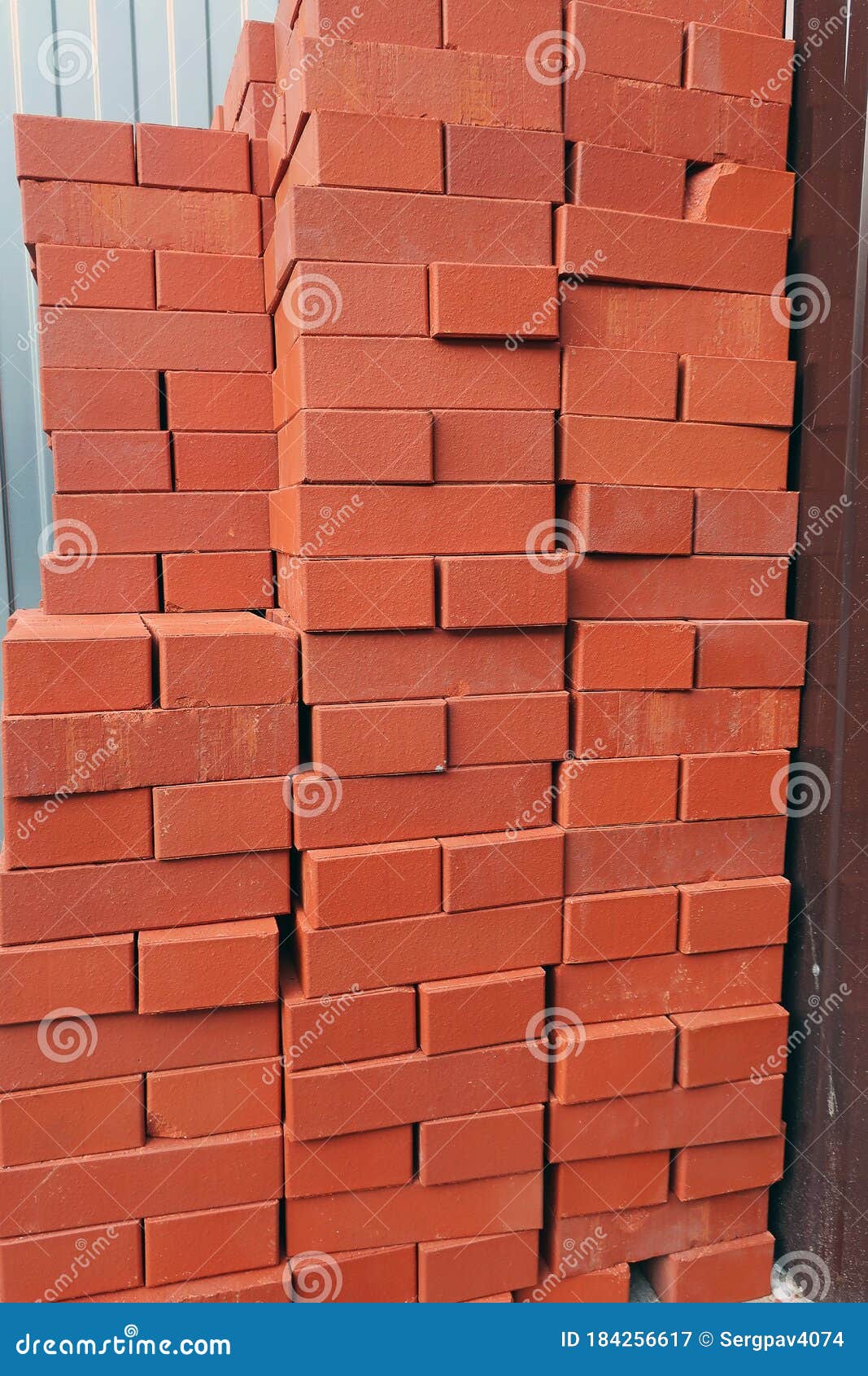 Stacked Orange Bricks at a Construction Site Stock Image - Image of ...