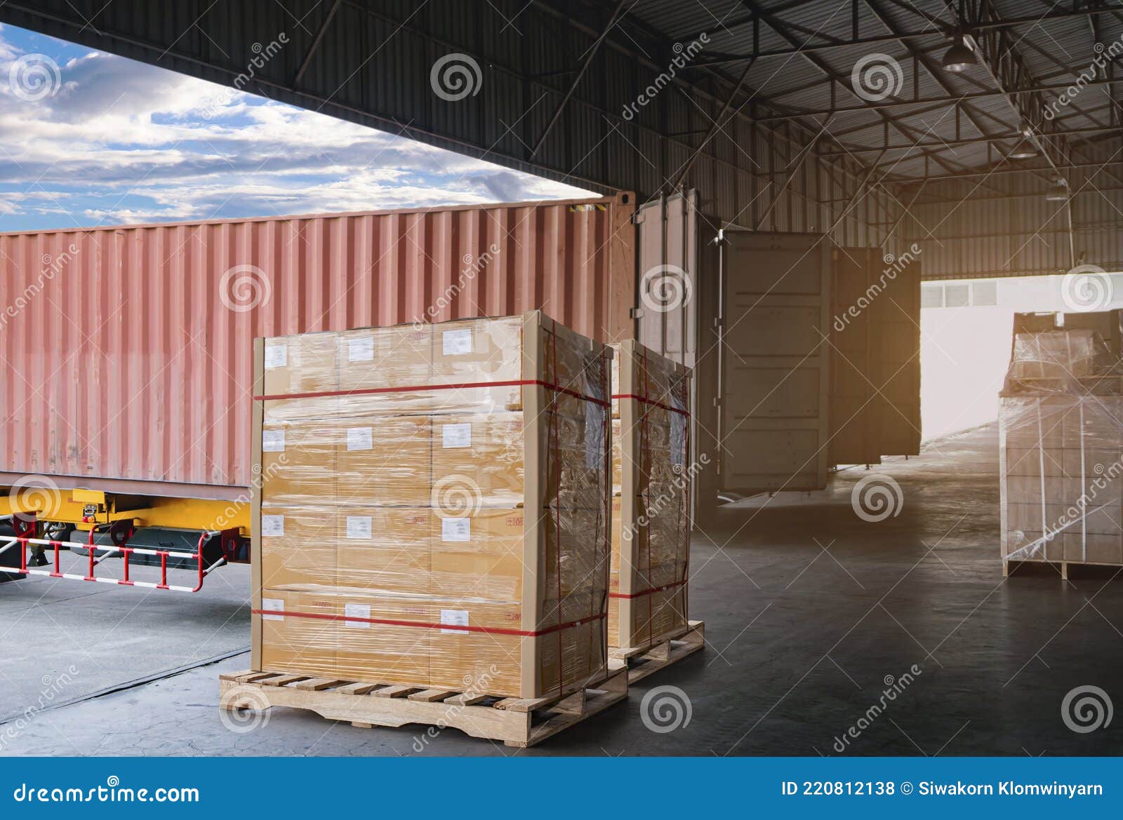 Stacked Of Package Boxes With Cargo Container. Trailer Parked Loading ...