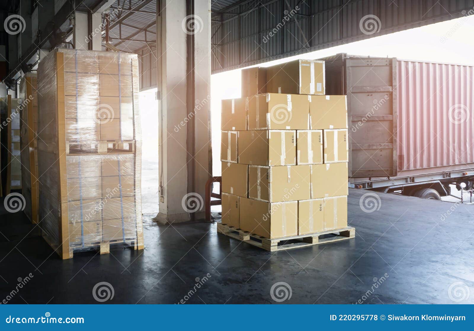 Stacked of Package Boxes Load into Cargo Container. Truck Parked ...