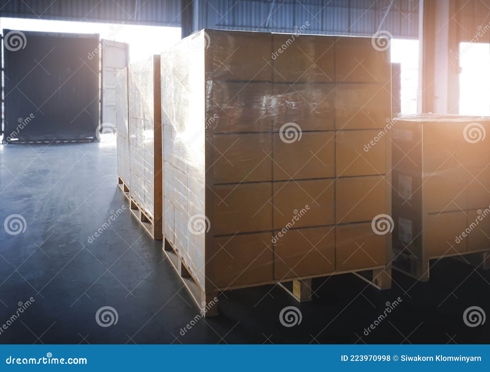 Stacked of Package Boxes Load into Cargo Container. Truck Parked ...