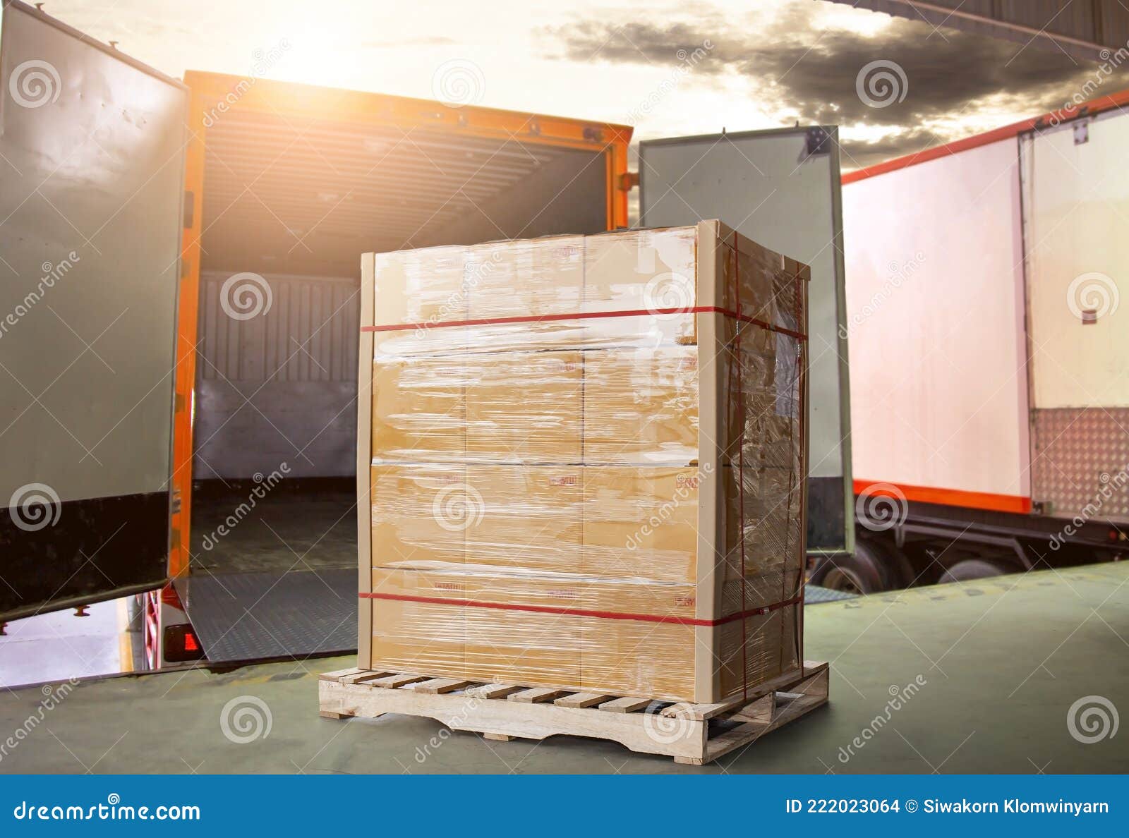 Stacked of Package Boxes on Pallet Load with Cargo Container. Trucks ...