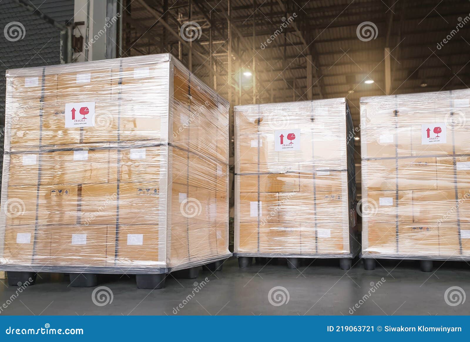 Stacked of Package Boxes Wrapped Plastic Flim on Plastic Pallets at ...