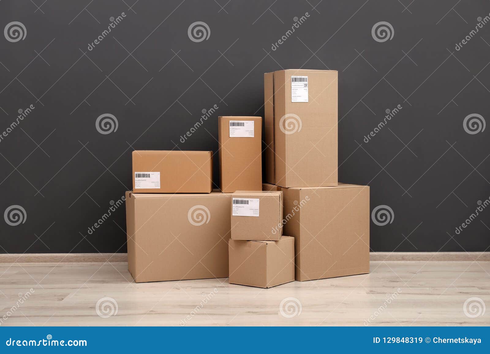 Stacked Parcel Boxes on Floor Stock Image - Image of container, pack ...